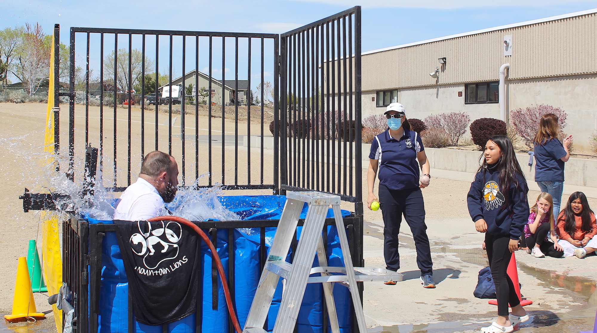 Meneley students dunk principal as reading reward | Serving Minden ...