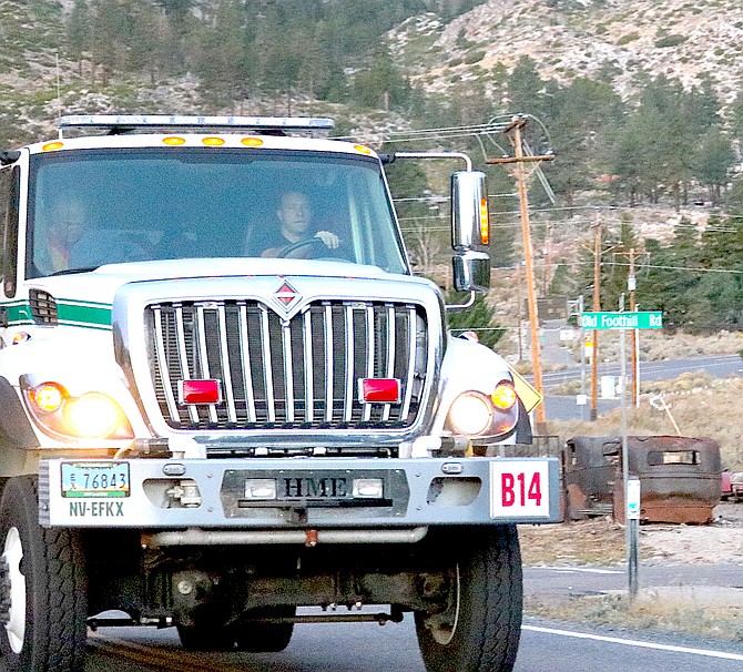 Firefighters respond to rekindled burn piles | Serving Minden ...